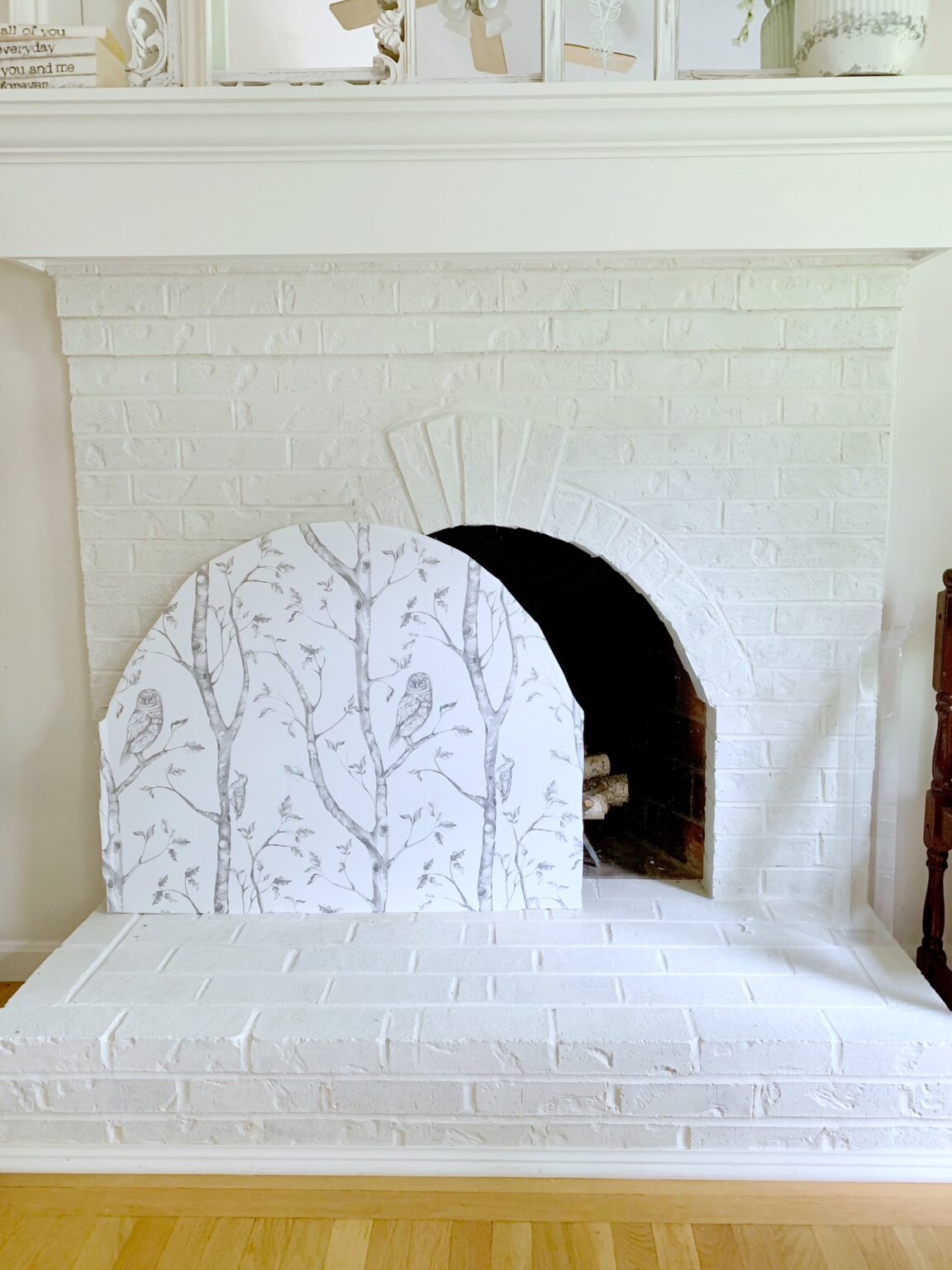 DIY Fireplace Cover Board You Can Make in an Afternoon - Celebrated Nest